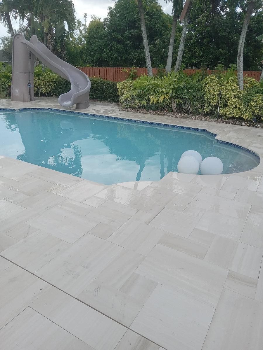 Elevate Your Pool Deck with Crema Vena Leather Finish Marble